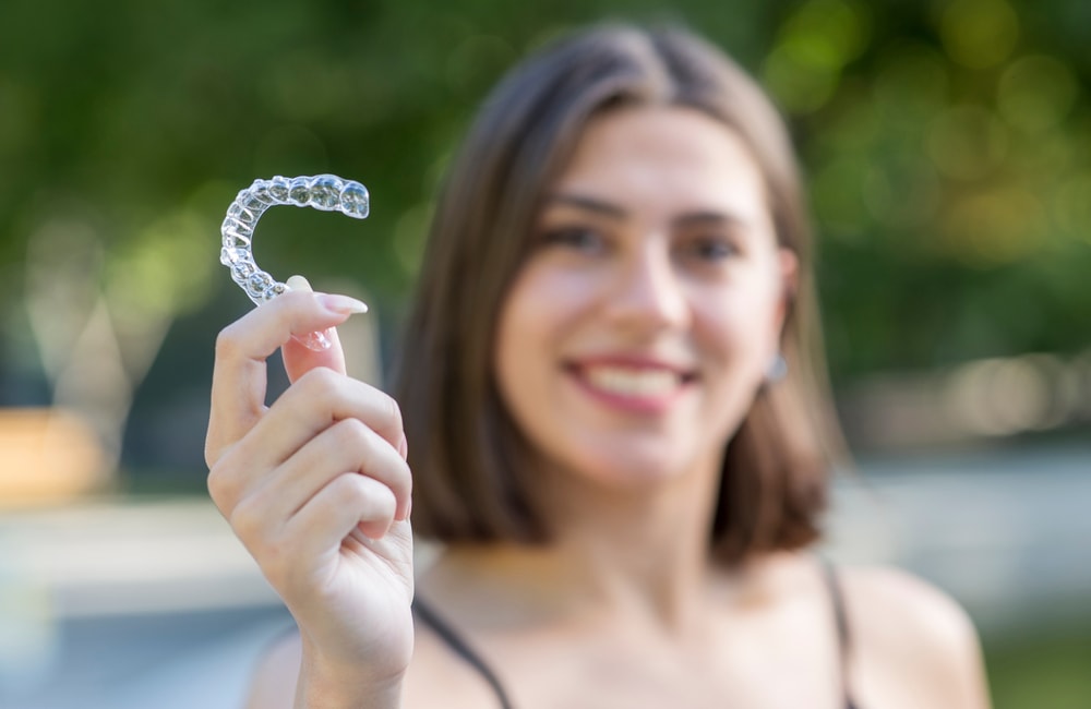 What’s the Difference Between SureSmile and Invisalign?